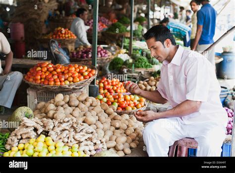 Man Buying Vegetables From A Market Stall Sohna Gurgaon Haryana India Stock Photo Alamy