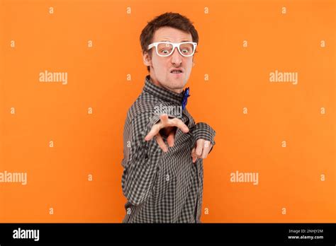 Portrait Of Funny Crazy Disabled Man Nerd Pointing And Looking At
