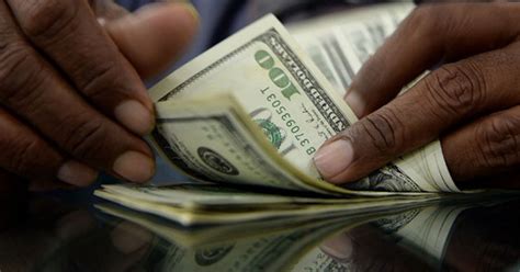 ماذا سيحدث للدولار حال تخلفت أمريكا عن سداد الديون؟