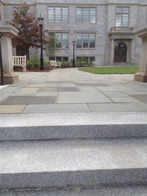 Granite Stairs And Pennsylvania Bluestone For Elegant Spiral Staircase