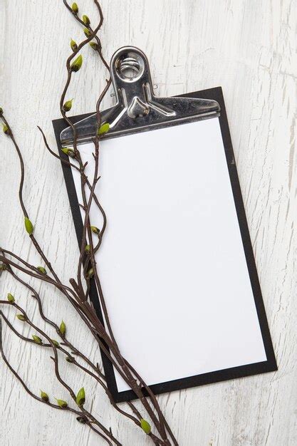 Premium Photo Close Up Of Clipboard On Table