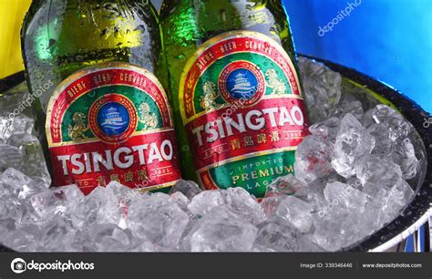 Two bottles of Tsingtao beer in bucket with crushed ice – Stock ...