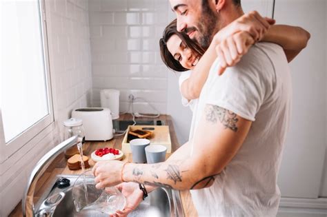 Free Photo Couple Washing Dishes Together