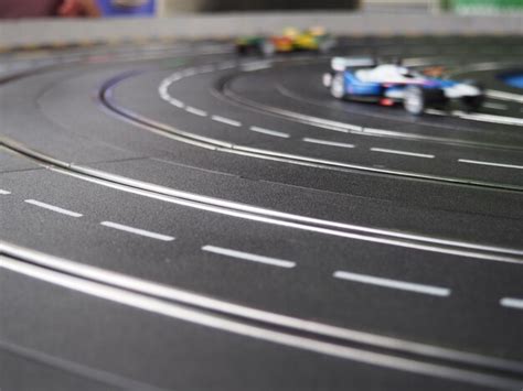 Premium Photo Blurred Motion Of Electric Slot Car On Race Track