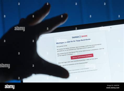 Fraudulent Phishing Email On A Laptop Requesting An Important Update