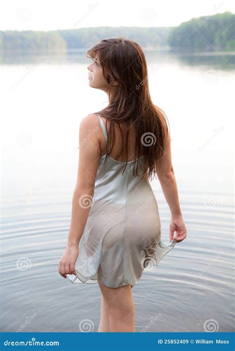 Woman Wading In Lake Stock Image Image Of Evening Lake 25852409