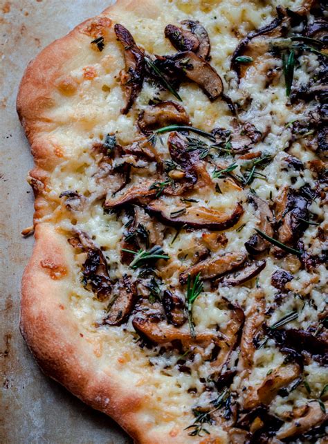 Mushroom Pizza With Havarti Cheese Fresh Herbs And White Truffle Oil