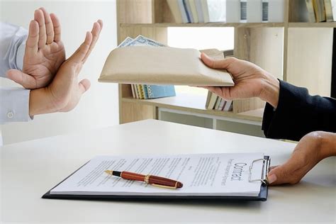 Premium Photo Cropped Image Of Business Colleagues Dealing In Money