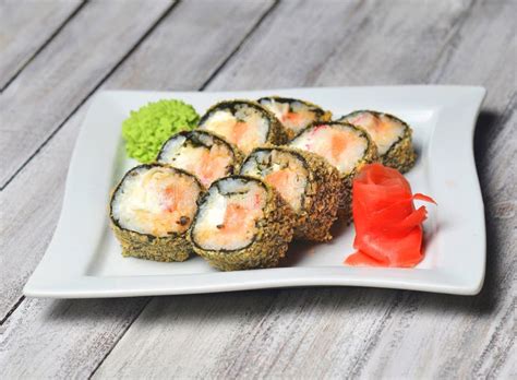 Sushi Roll Banzai Hot Roll Philadelphia With Shrimp On A Plate Stock