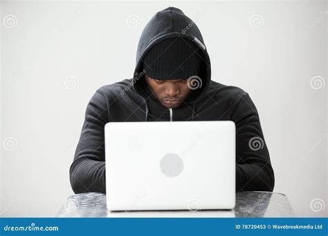 hacker using a laptop stock image image of crime hacking 78720453