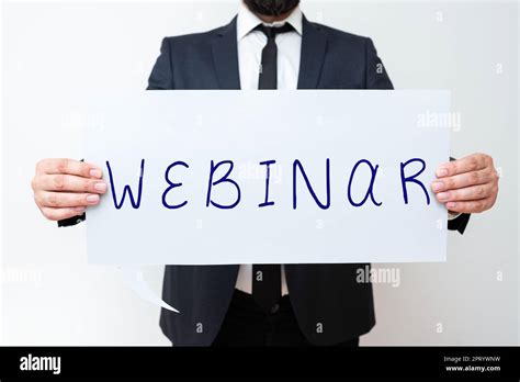 Sign Displaying Webinar Word For Engaging Online Event Where A Speaker Deliver A Presentation