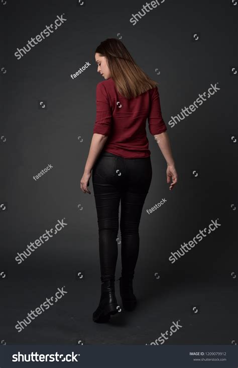 Woman Walking Away Looking Back