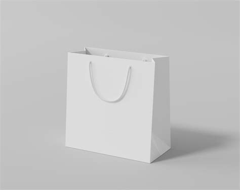 흰색 종이 가방 브랜딩을 위한 빈 쇼핑백 프리미엄 사진