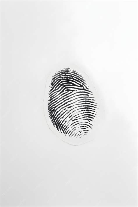 Premium Photo Singular Fingerprint Impression On Stark White Backdrop Symbolizing Personal