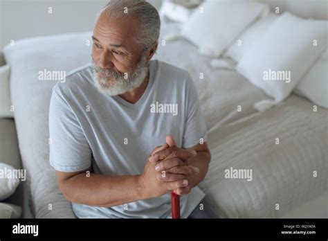 Man Holding Stick Hi Res Stock Photography And Images Alamy