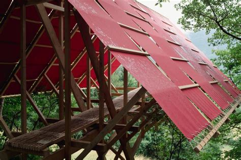 Oversized Red Roof Shelters Patagonian Shadow Cabin In France