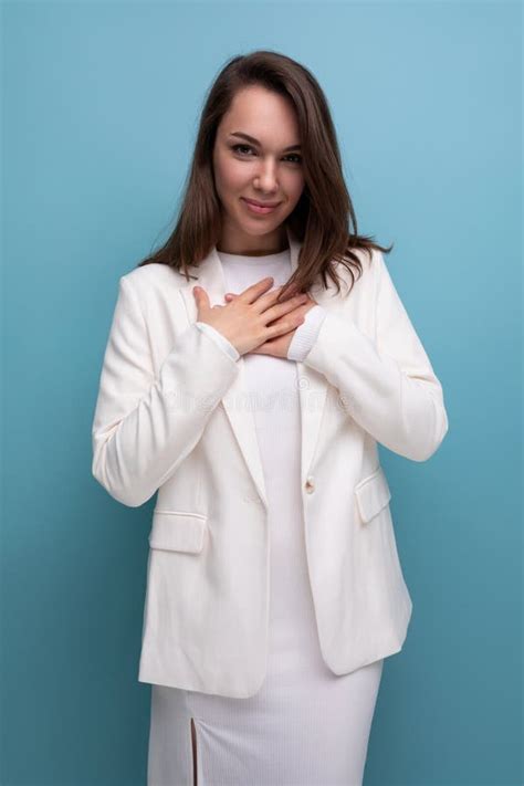 Portrait Of A Kind Well Groomed Long Haired Brunette Woman In A White