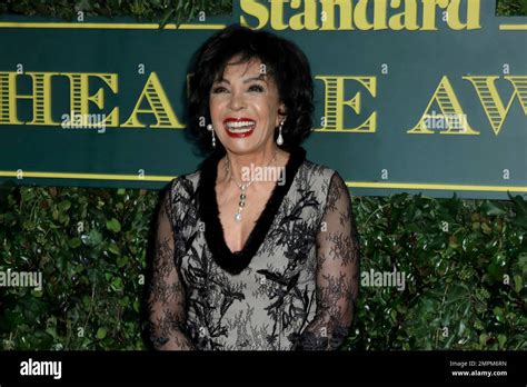 Singer Dame Shirley Bassey Poses For Photographers On Arrival At The