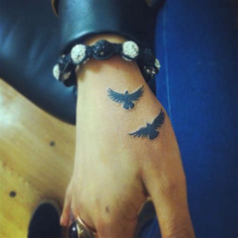 Crow Silhouette Tattoo