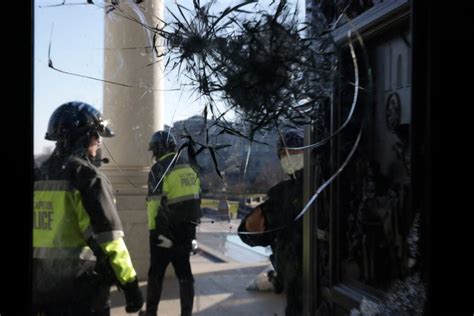 Capitol Rioters Shown Beating Face Down Police Officer