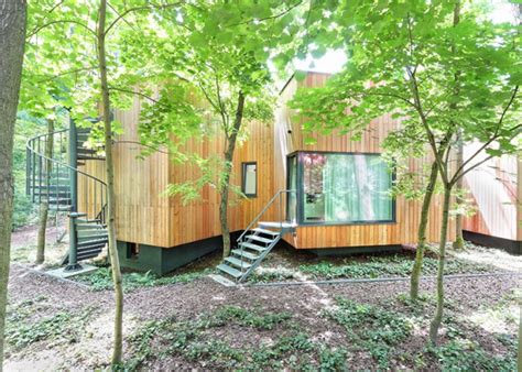 Podkowa House By Jakub Szcz Sn Fitted Around Trees In A Polish Forest