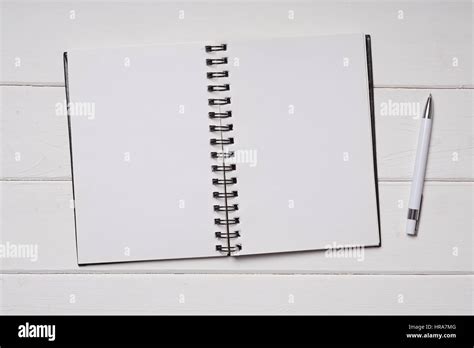 Notebook And Pen On White Wooden Desk Stock Photo Alamy