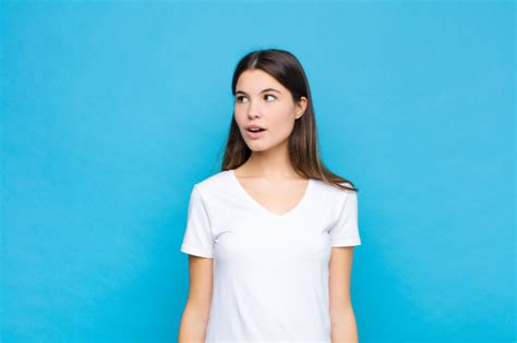 Premium Photo Young Pretty Woman Feeling Shocked Happy Amazed And