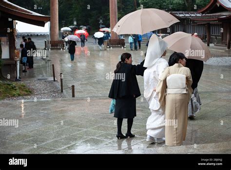 A Japanese Bride Is Attended By Her Mother And Her Maidens At The Meiji Jingu Shrine Tokyo
