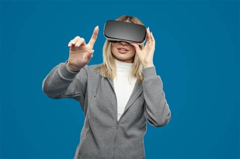 Premium Photo Blond Woman Interacting With Virtual Interface