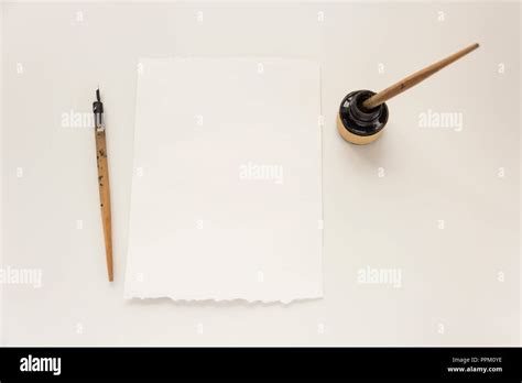 An Old Nib Pen A Bottle Of Black Ink A Sheet Of Paper With Place For Text Invitation Letter