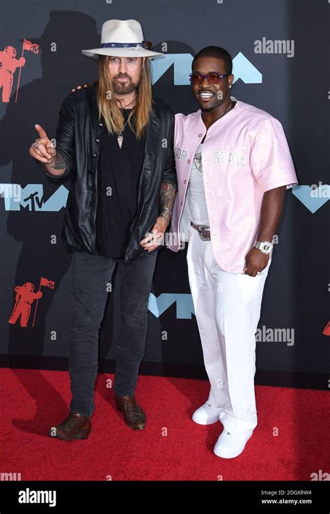 Billy Ray Cyrus And ASAP Ferg Arriving At The MTV Video Music Awards