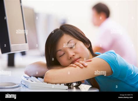 Woman In Computer Room Sleeping Stock Photo Alamy