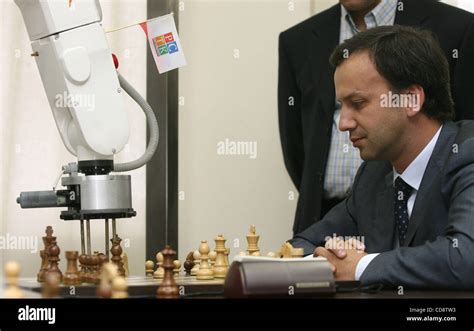 chess match with a chess playing robot pictured the chairman of the