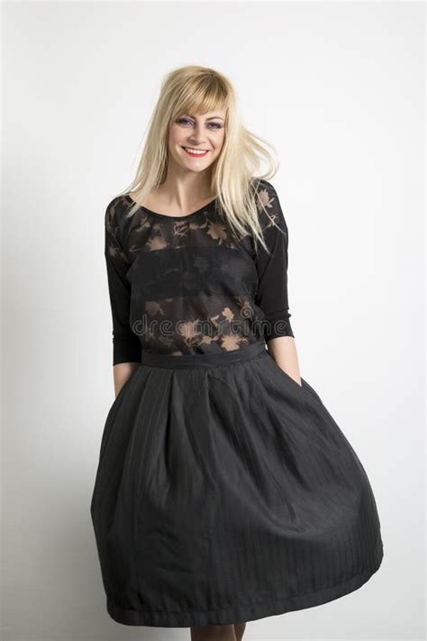 Attractive Fashion Indoor Portrait Of Beautiful Blonde Girl Posing In