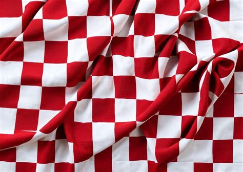 Premium Photo A Red And White Checkered Cloth With A Red Checkerboard Pattern