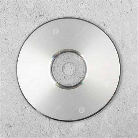 Realistic White Cd Template On White Cement Background Stock Image