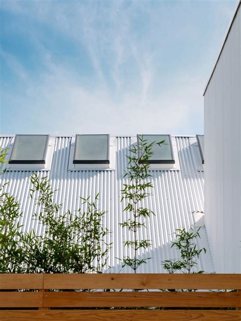 Corrugated White Metal Clads Vietnamese Restaurant In Austin