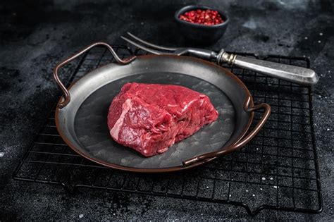 Premium Photo Piece Of Raw Rump Steak Prepared For Cooking Black