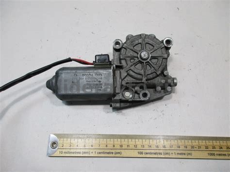 Моторчик стеклоподъемника левый 0130821508, RENAULT (Рено) MAGNUM ...