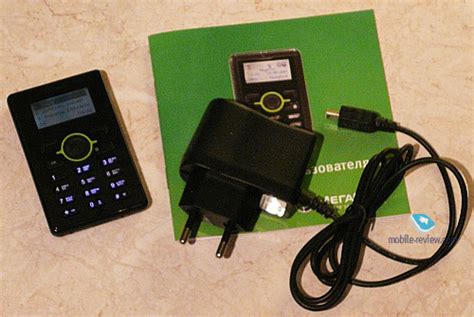 Mobile-review.com Минифон: Ну очень мелкий телефон