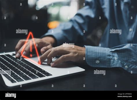 businessman programmer developer using laptop computer with triangle