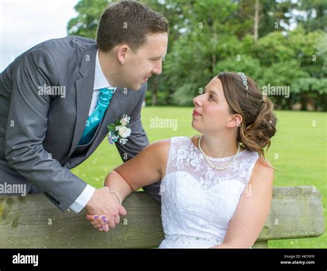 Newly Wed Husband And Wife Having Formal Photos Taken At Their Wedding