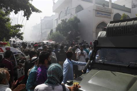 Karachi Crash Pakistani Airliner Crashes With Over 100 On Board Cnn