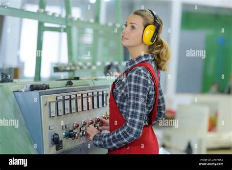 Female Worker Operating Control Panel In Factory Stock Photo Alamy