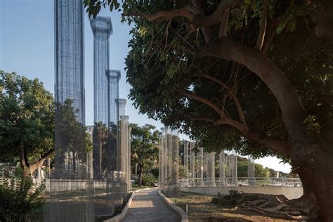 Edoardo Tresoldi Installs 46 Wire Mesh Columns On Italian Coast