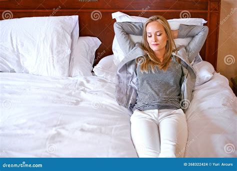 Sweet Dreams Ahead An Attractive Young Woman Relaxing On Her Bed