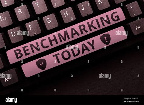 Hand Writing Sign Benchmarking Business Idea Evaluate Something By
