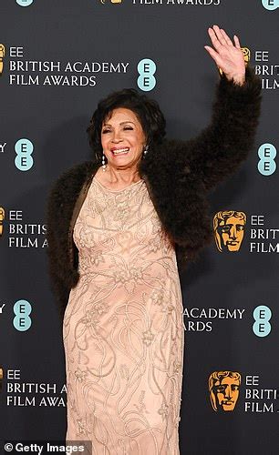 Dame Shirley Bassey 85 Looks Phenomenal In A Sequin Gold Dress At The
