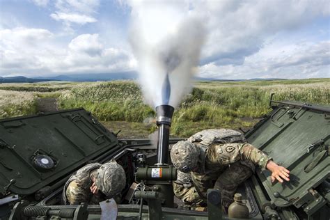 Mortar Blast Soldiers Use A 120 Mm Mortar System On An M1129 Mortar