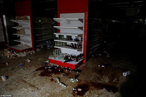 Venezuelans Turn To Looting In Caracas During Fourth Day Of Power